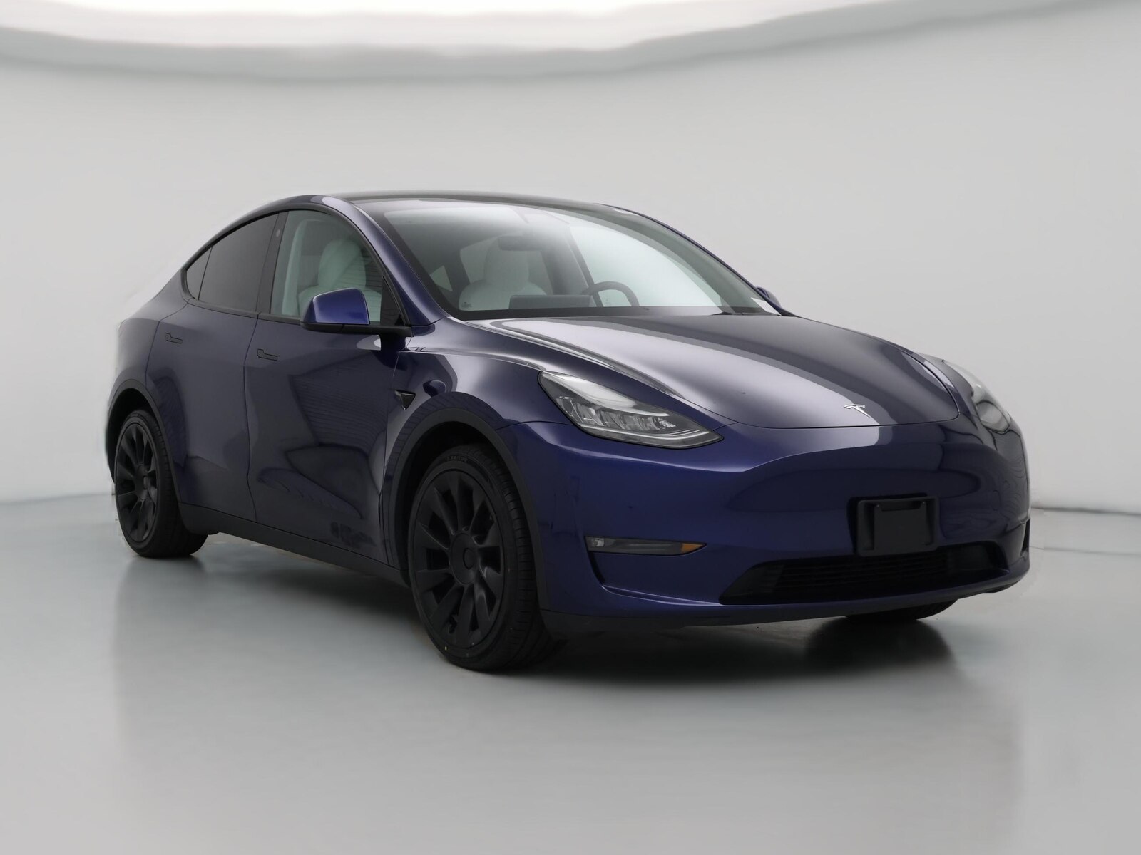 Blue Tesla Model Y with White Interior - iSeeCars.com